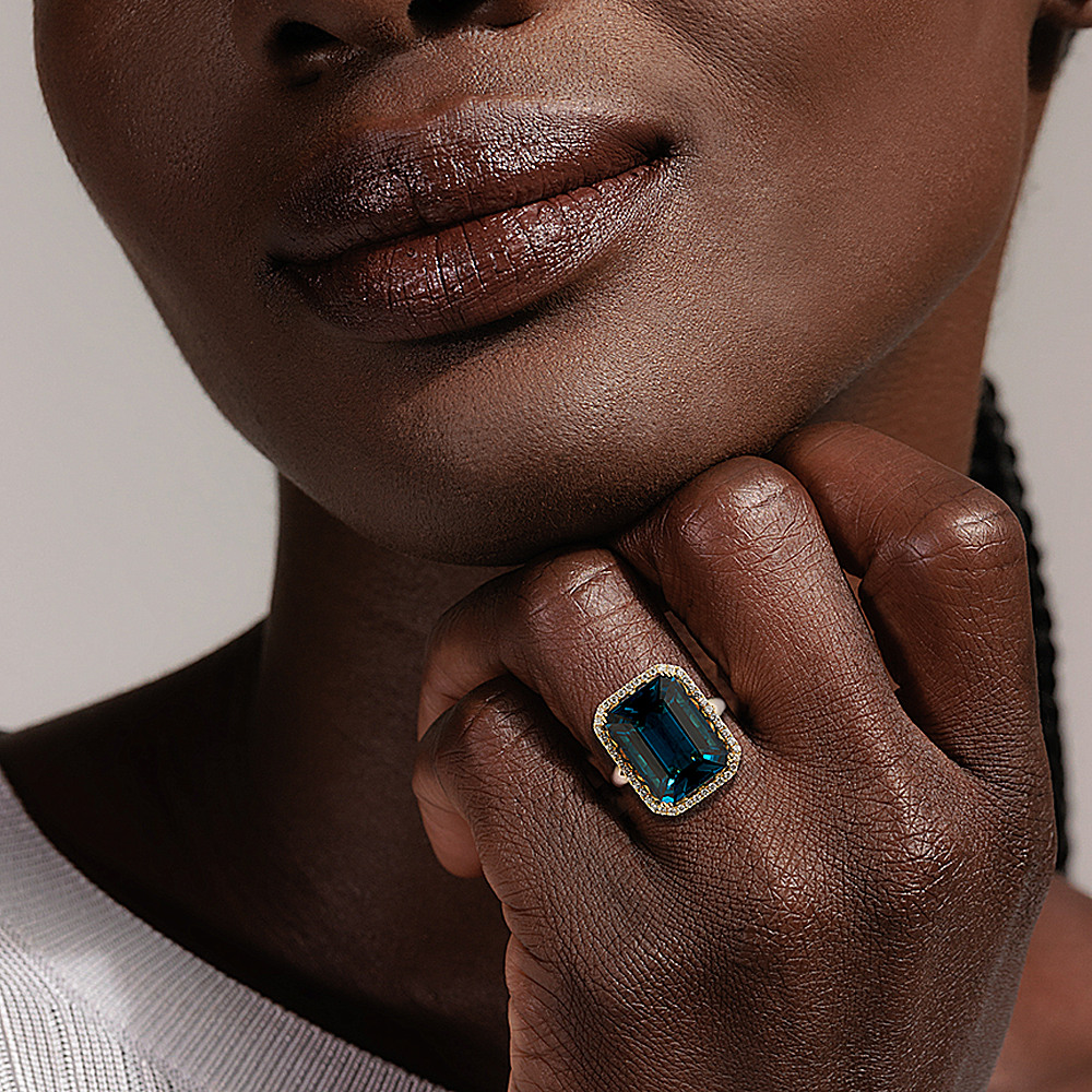 Nascha London Blue Topaz & Diamond Halo Ring | Shane Co.